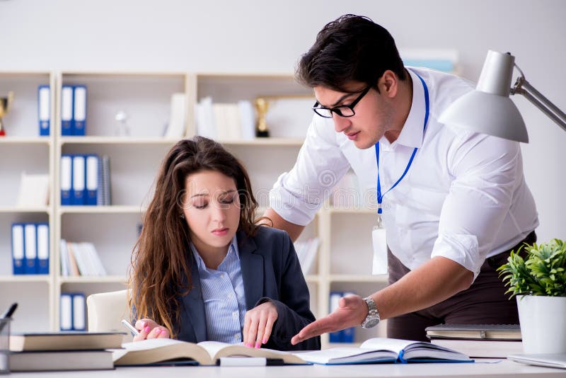 The Teacher Explaining To Student at Lecture Stock Image - Image of ...