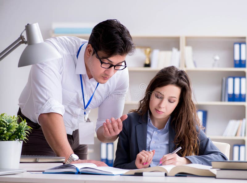 Teacher Explaining To Student at Lecture Stock Image - Image of ...