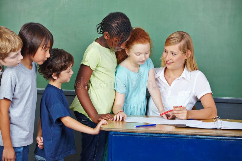Teacher Explains Grading for Students Stock Photo - Image of teacher ...