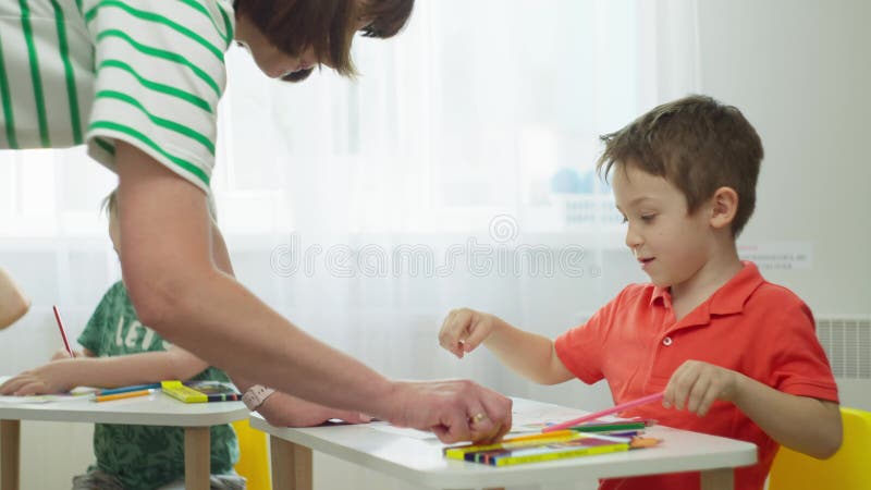 The Boy Diligently Completes the Coloring Task. Stock Footage - Video ...