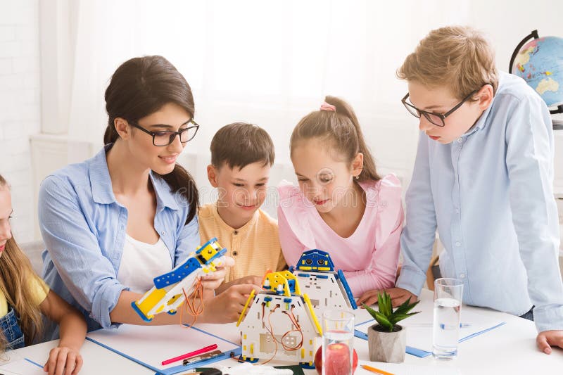 Teacher and Students Building a Robot in Classroom Stock Image - Image ...