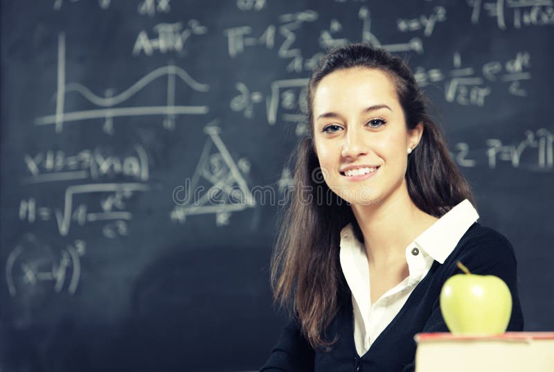 Teacher in Front of a Blackboard Stock Image - Image of teaching ...