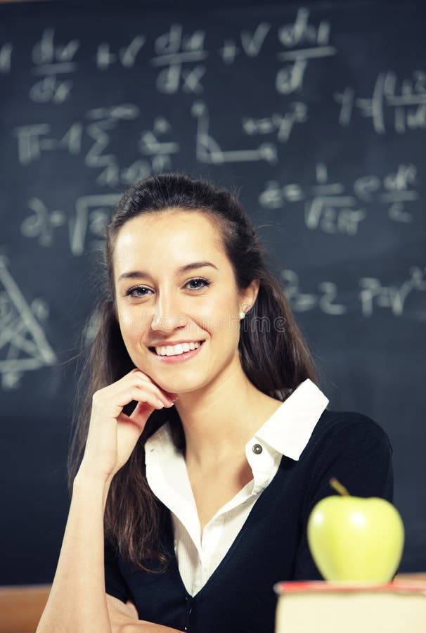 Teacher in Front of a Blackboard Stock Photo - Image of adult ...
