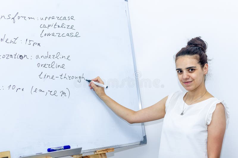 Teacher in Front of Whiteboard, the Teacher Writing on Whiteboard Stock ...