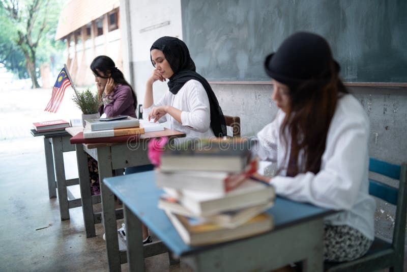Teacher Gathering in a Classroom Stock Image - Image of classroom ...