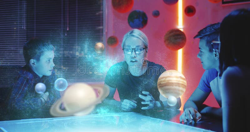 Teacher Using a Planet Earth Hologram in Class Stock Photo - Image of ...