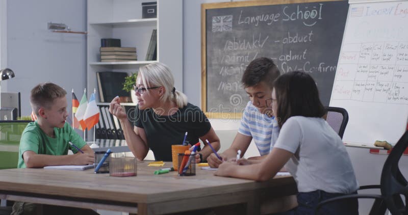 Teacher Giving Instruction To Student Stock Video - Video of children ...