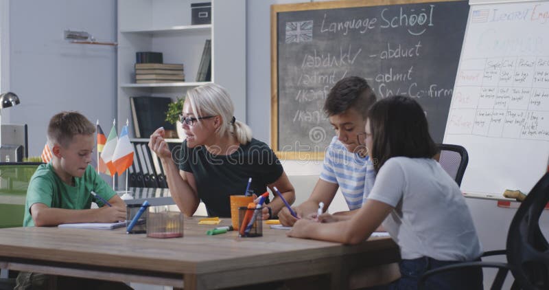 Teacher Giving Instruction To Student Stock Image - Image of teaching ...