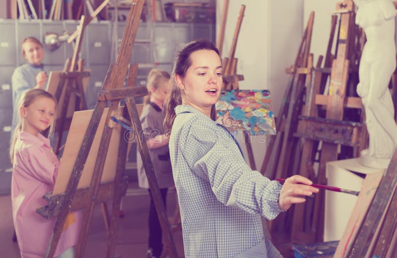 Teacher Giving Master Class during Painting Class Stock Image - Image ...