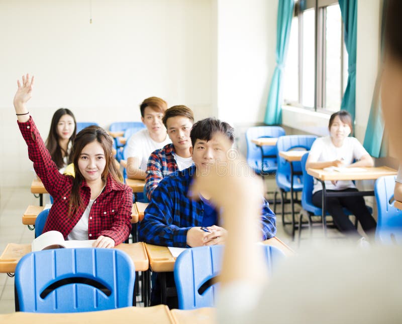 Teacher with Group of College Students in Classroom Stock Image - Image ...
