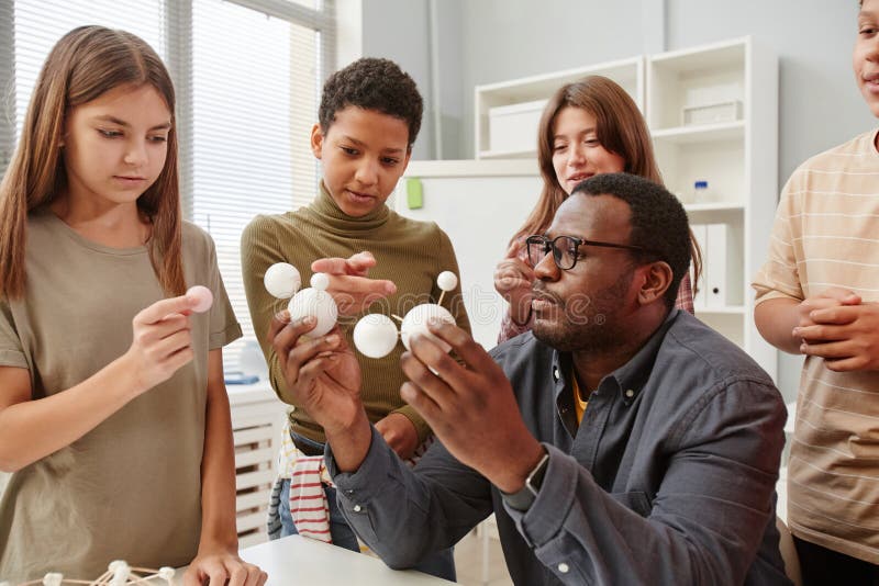 Teacher with Group of Kids in Science Class Stock Photo - Image of ...