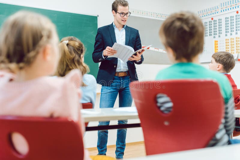 Teacher Handing Back Written Tests To the Class Stock Photo - Image of ...