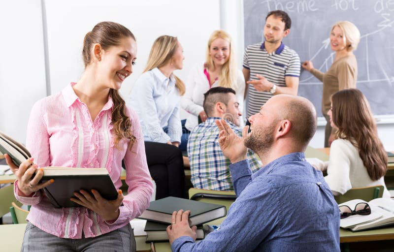 Teacher and Happy Adult Students Stock Photo - Image of education ...