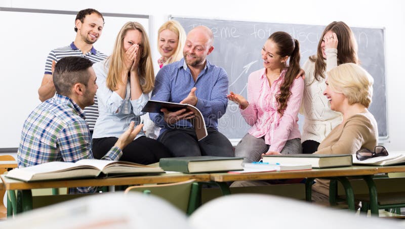 Teacher and Happy Adult Students Stock Photo - Image of education ...