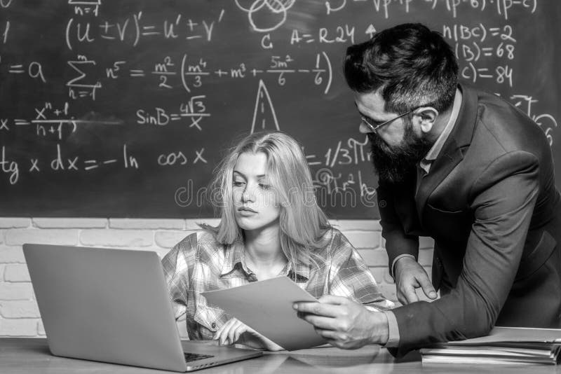 Teacher Helping His Students with Math or Mathematics on Education ...