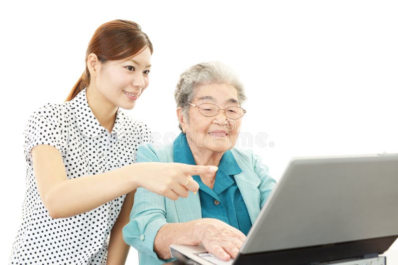 Teacher Helping Student on the Computer Stock Image - Image of elderly ...