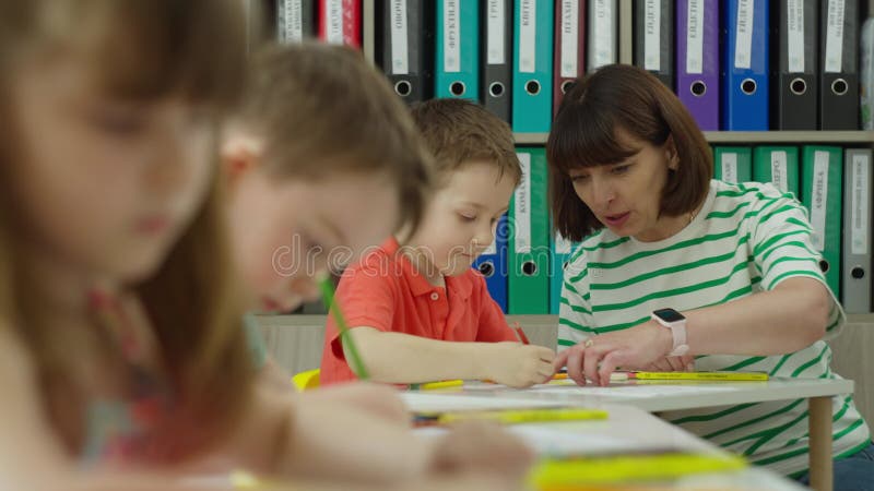 The Teacher Helps the Student To Correctly Complete the Tasks in the ...