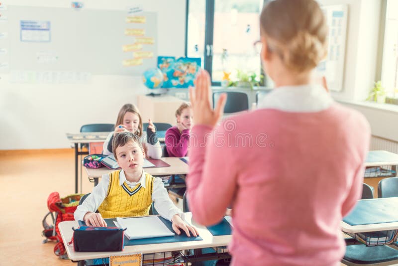 Teacher with Her Students in Class at Elementary School Stock Image ...