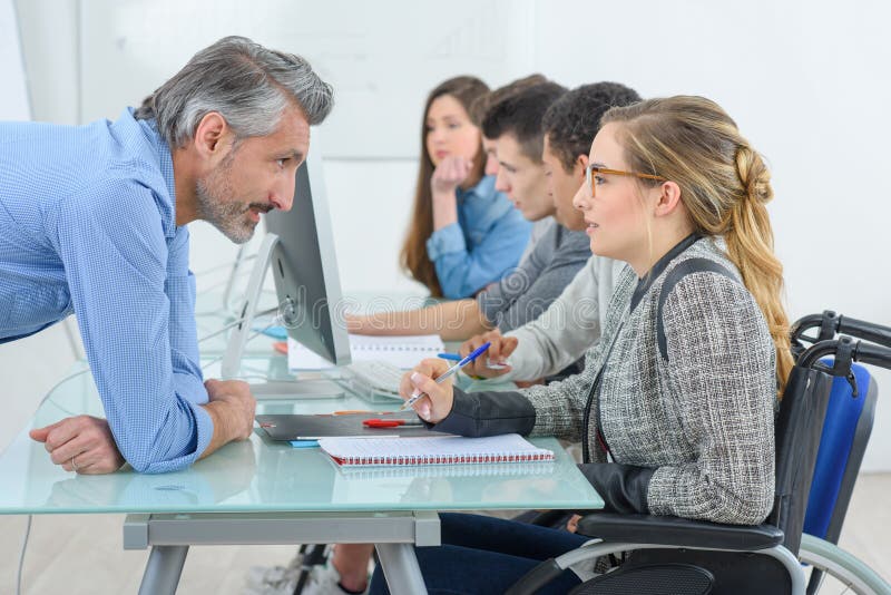 Young People Teacher Discuss Communicate University Classroom Stock ...