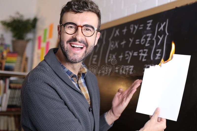 Teacher Holding White Paper on Fire in Classroom Stock Image - Image of ...