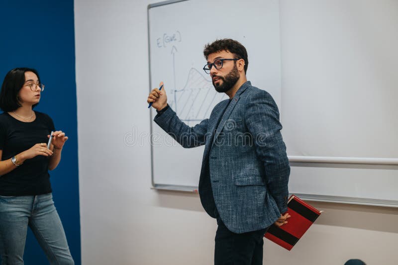 Teacher Explaining a Concept To a Student in a Classroom Stock Image ...