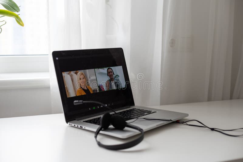 Teacher Hosting Online Class Using Video Conference on Laptop Editorial ...