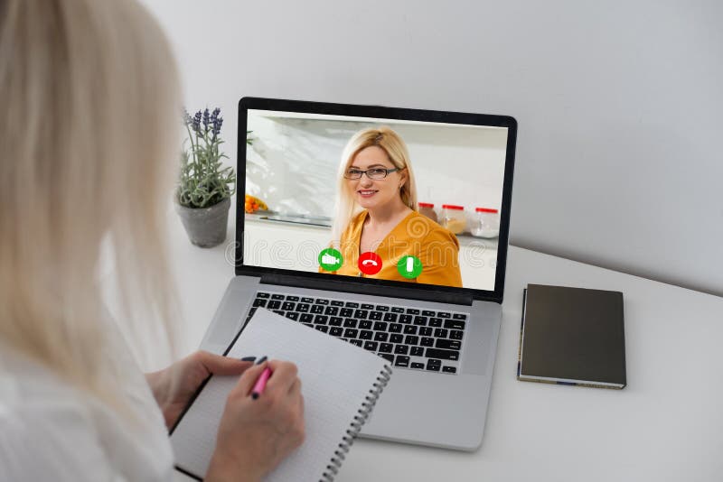 Teacher Hosting Online Class Using Video Conference on Laptop Editorial ...