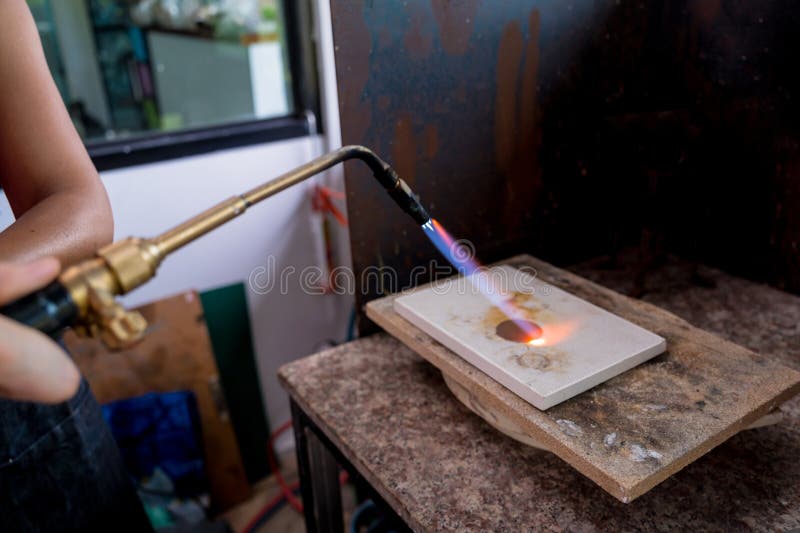 Teacher Jeweler and Student Using Burner in Workshop Stock Photo ...