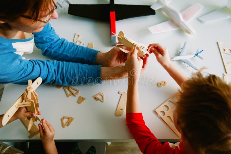 Teacher and Kids Making Toy Planes, Learning Concept Stock Image ...