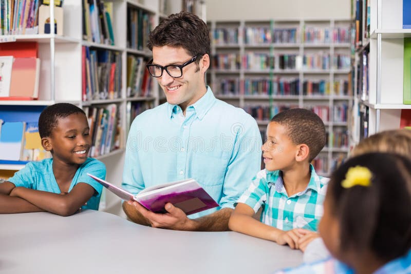 Teacher and Kids Reading Book in Library Stock Image - Image of bonding ...