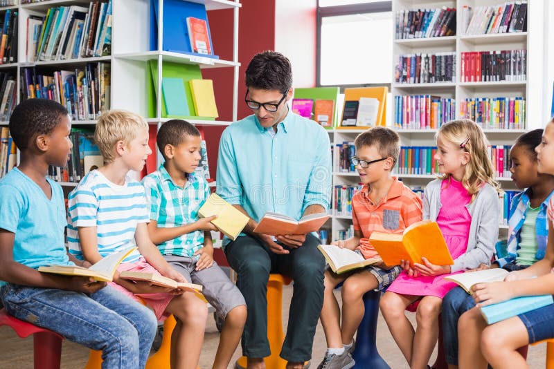 Teacher and Kids Reading Book in Library Stock Image - Image of ...