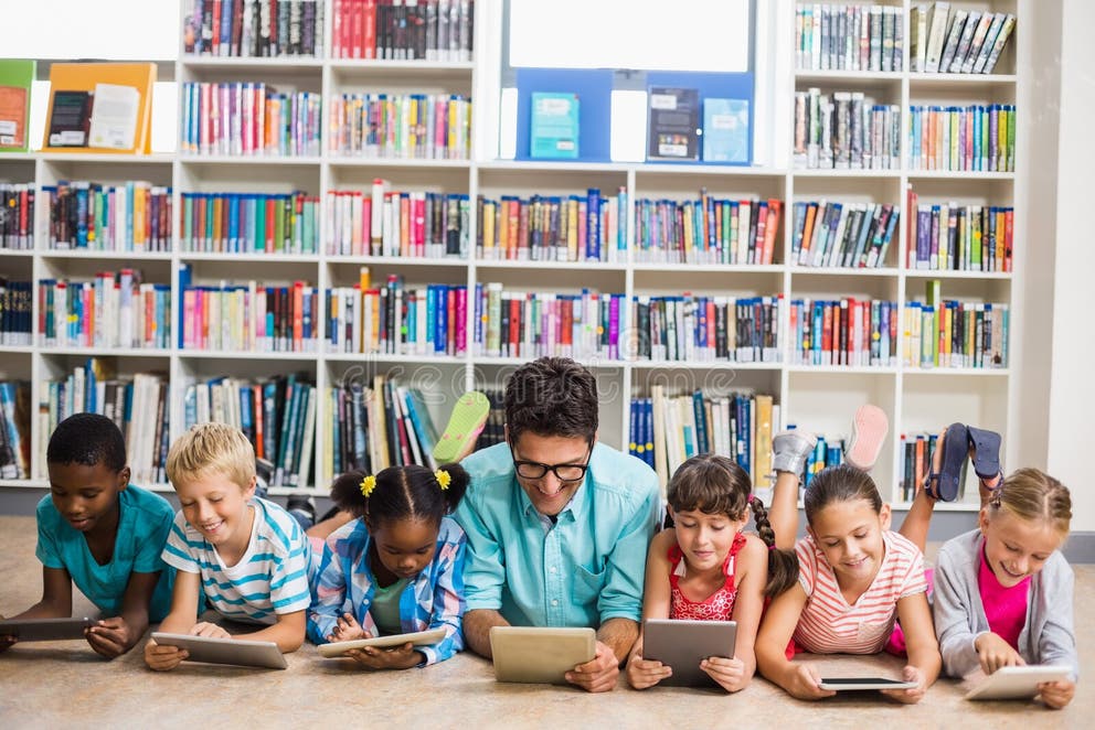 Teacher and Kids Using Digital Tablet in Library Stock Image - Image of ...