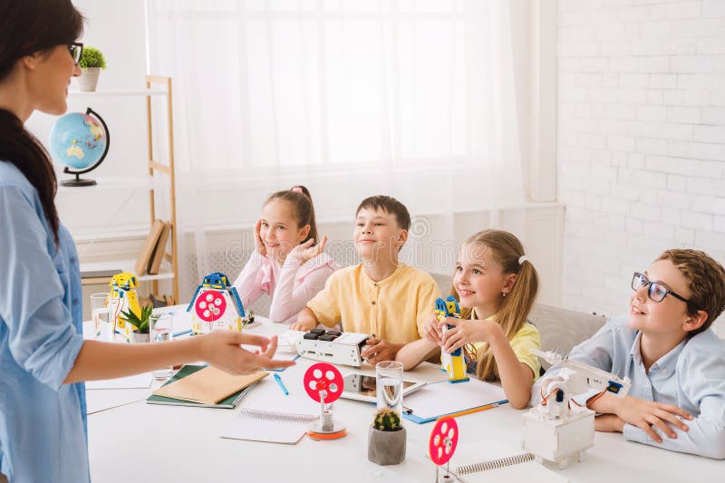 Teacher Leading Elementary School Students in STEM Activity Stock Image ...