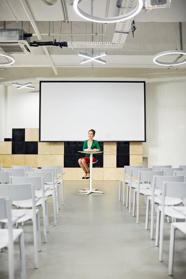 Teacher in lecture hall stock photo. Image of business - 91186668