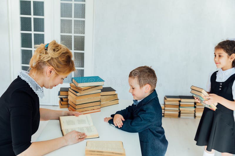 Teacher at Lesson on Teaching Children in School Classroom Stock Photo ...