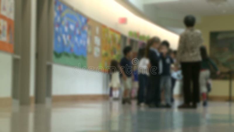 Teacher Lining Up Grammar School Students in the Hallway (1 of 2) Stock ...
