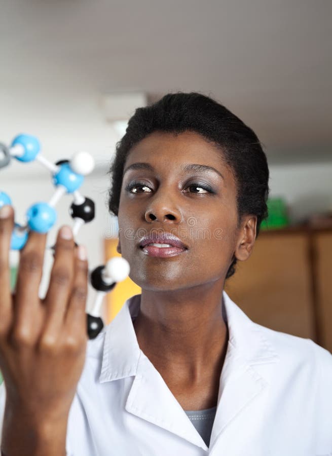 Teacher Looking at Molecular Structure in Science Stock Image - Image ...