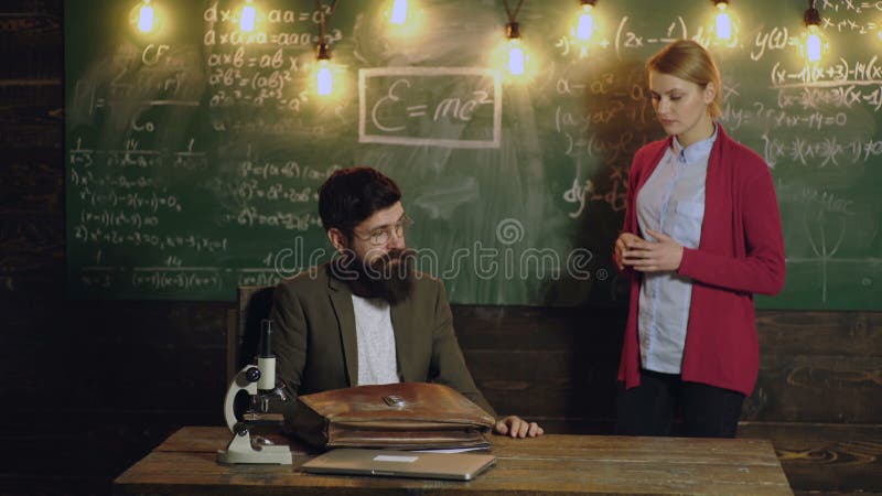 Teacher in Math School Explanation Math Lesson. Professor in a ...