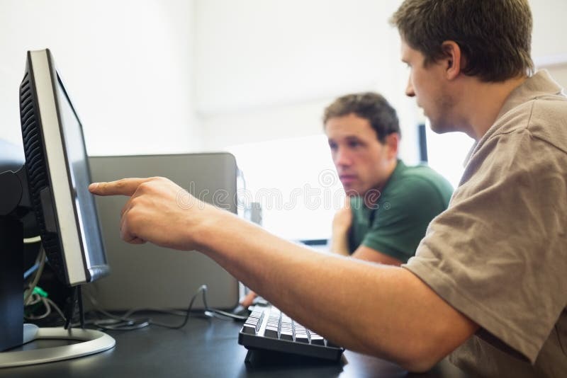 Teacher and Mature Student in Computer Room Stock Photo - Image of ...