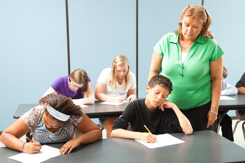Teacher Monitors Standardized Test Stock Image - Image of achievement ...
