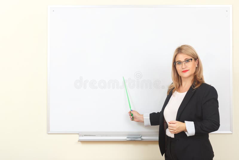 Teacher with a Pointer at the Blackboard Stock Image - Image of ...