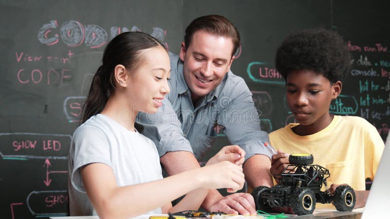 Teacher Pointing at Laptop Screen while Explain Car Model System ...