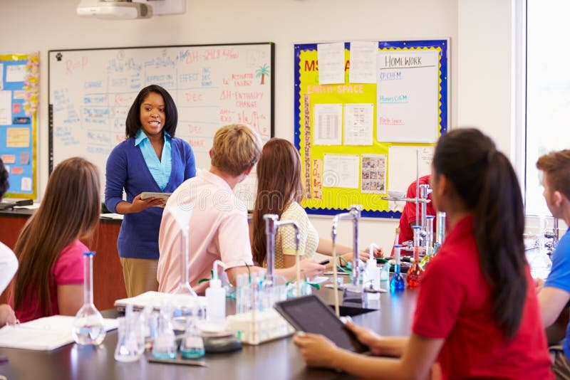 Teacher and Pupils in High School Science Class Stock Photo - Image of ...