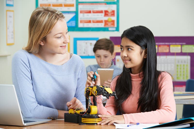 Teacher with Pupils in Science Lesson Studying Robotics Stock Photo ...
