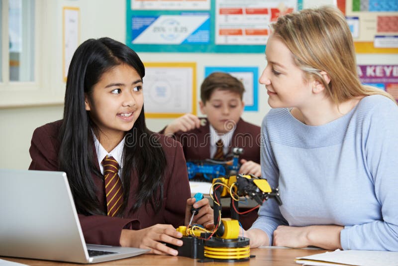 Teacher with Pupils in Science Lesson Studying Robotics Stock Image ...