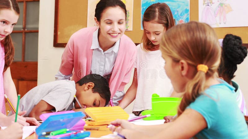 Cute Pupils Working at Desks in Classroom Stock Video - Video of lesson ...