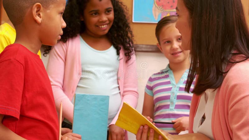 Teacher Reading Her Pupils a Story Stock Video - Video of class, cute ...