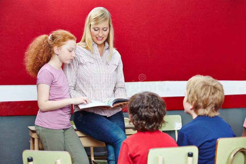 Teacher Reads from Textbook in Class Stock Image - Image of education ...