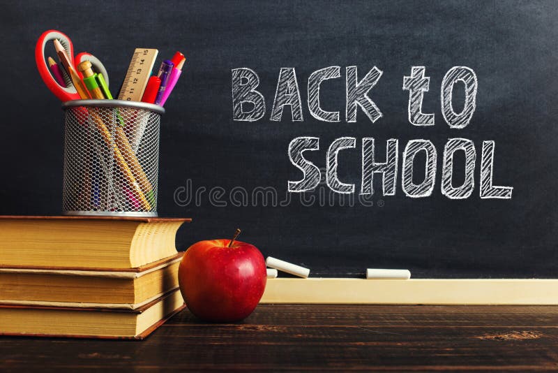 Teacher S Desk with Writing Materials, a Book and an Apple, a Blank for ...