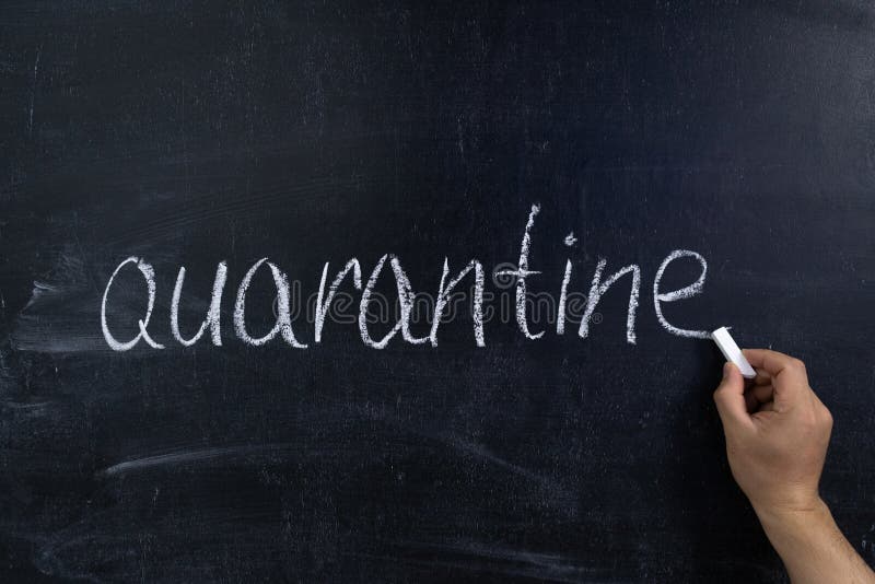 The Teacher`s Hand Writes the Word QUARANTINE on a Chalkboard Stock ...